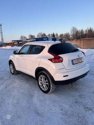 White Nissan Juke 2014 in Panevezys, with an engine capacity of 1.60 L and mileage of 94 thousand km for 5100 €, photo 7 on AUTOMOTO.COM.LV