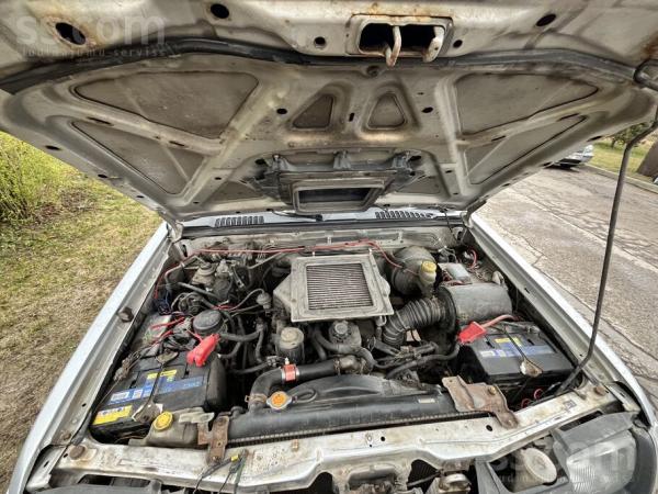 Grey Nissan king-cab 1999 in Valka, with an engine capacity of 2.50 L and mileage of 500 thousand km for 4500 €, photo 3 on AUTOMOTO.COM.LV