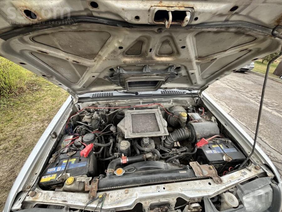 Pelēks Nissan king-cab 1999 Valka, ar dzinēja tilpumu 2.50 L un nobraukumu 500 tūkst. km par 4500 €, foto 4 vietnē AUTOMOTO.COM.LV