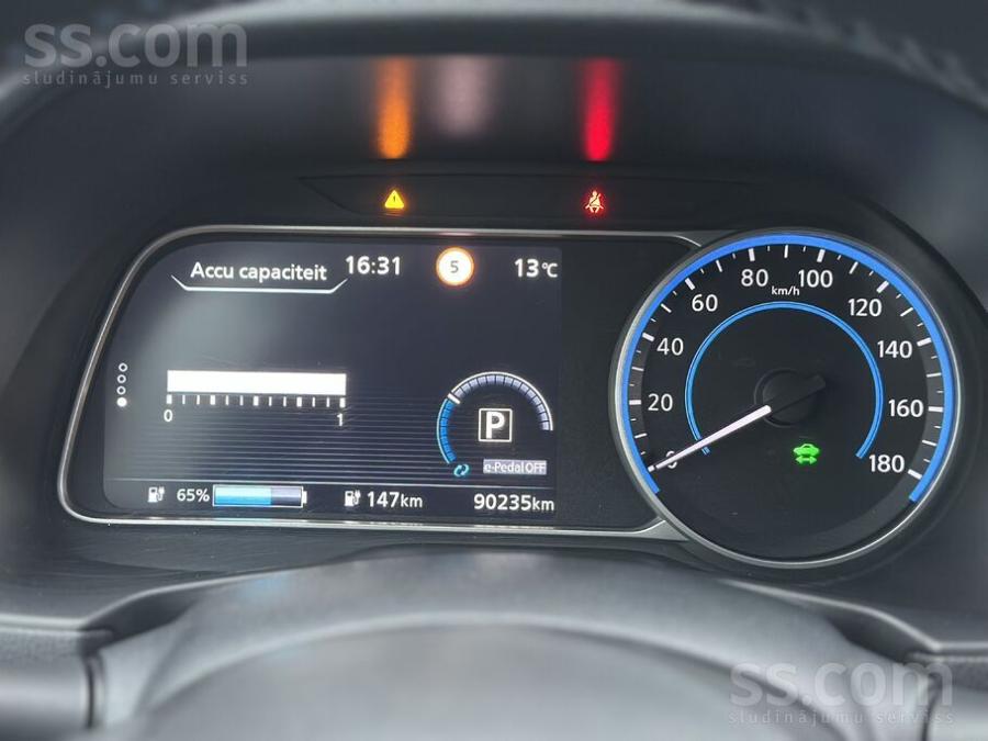 Black Nissan Leaf 2018 in Riga, with an engine capacity of 0.00 L and mileage of 90 thousand km for 11990 €, photo 17 on AUTOMOTO.COM.LV
