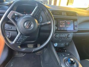 Red Nissan Leaf 2022 in Panevezys, with an engine capacity of 0.00 L and mileage of 40 thousand km for 13200 €, photo 6 on AUTOMOTO.COM.LV