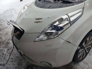 White Nissan Leaf 2014 in Jonava, with an engine capacity of 0.00 L and mileage of 255 thousand km for 2600 €, photo 6 on AUTOMOTO.COM.LV