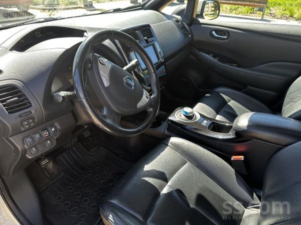 White Nissan Leaf 2015 in Riga, with an engine capacity of 0.00 L and mileage of 137 thousand km for 5590 €, photo 9 on AUTOMOTO.COM.LV