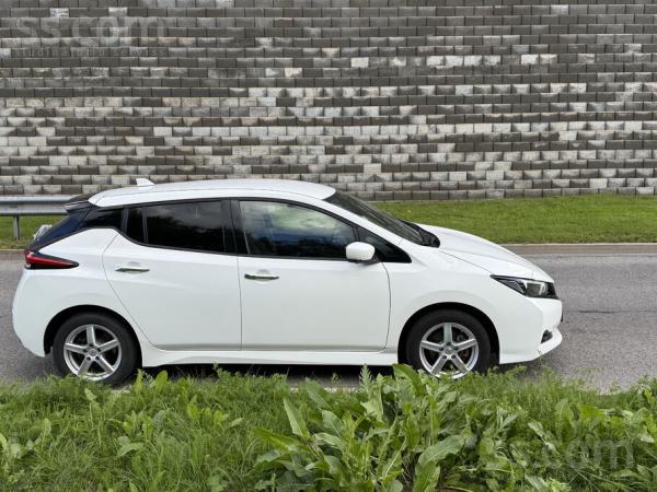 White Nissan Leaf 2023 in Riga, with an engine capacity of 0.00 L and mileage of 102 thousand km for 14500 €, photo 9 on AUTOMOTO.COM.LV