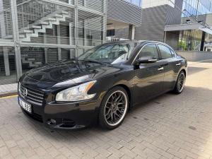 Melns Nissan Maxima 2012 Viļņa, ar dzinēja tilpumu 3.50 L un nobraukumu 262 tūkst. km par 5500 €, foto  vietnē AUTOMOTO.COM.LV