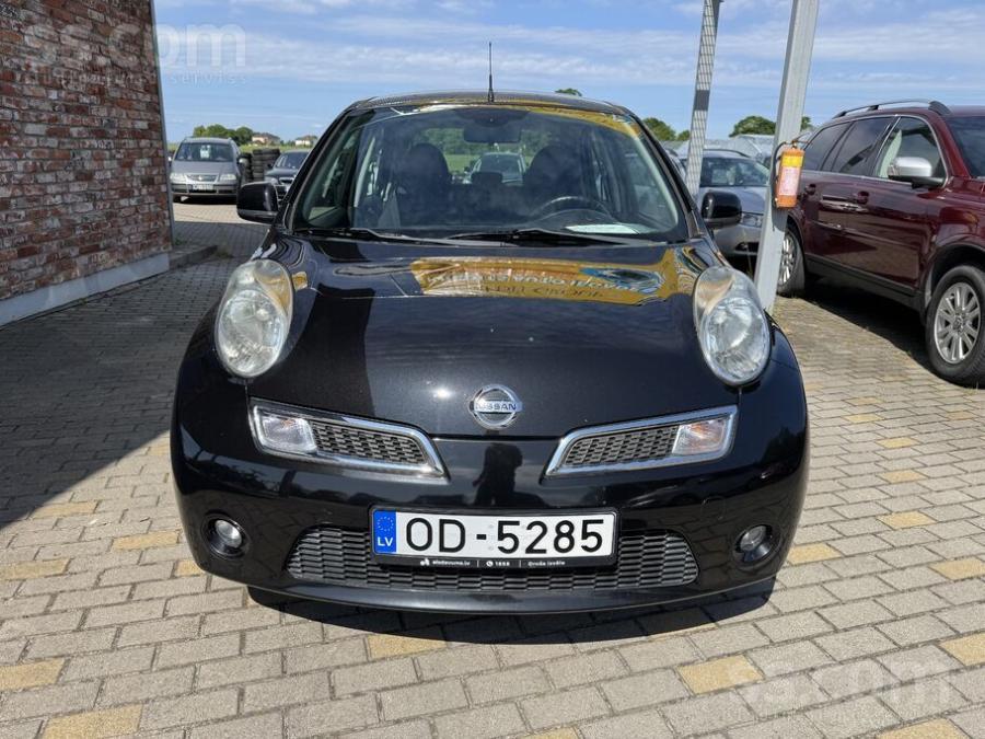 Black Nissan Micra 2009 in Talsi, with an engine capacity of 1.20 L and mileage of 237 thousand km for 2895 €, photo 2 on AUTOMOTO.COM.LV