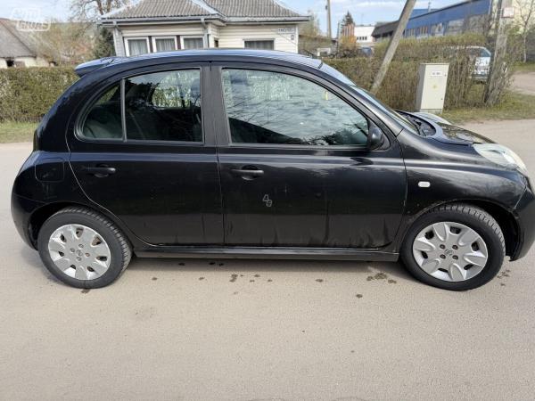 Black Nissan Micra 2009 in Kaunas, with an engine capacity of 1.40 L and mileage of 312 thousand km for 850 €, photo 3 on AUTOMOTO.COM.LV
