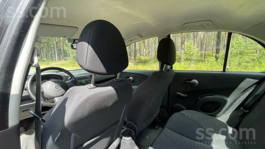 Black Nissan Micra 2009 in Riga, with an engine capacity of 1.50 L and mileage of 222 thousand km for 2200 €, photo 14 on AUTOMOTO.COM.LV