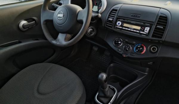 Black Nissan Micra 2009 in Riga, with an engine capacity of 1.20 L and mileage of 214 thousand km for 2990 €, photo 6 on AUTOMOTO.COM.LV