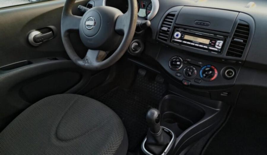 Black Nissan Micra 2009 in Riga, with an engine capacity of 1.20 L and mileage of 214 thousand km for 2990 €, photo 7 on AUTOMOTO.COM.LV