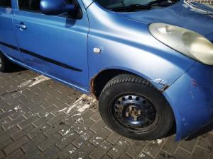 Blue Nissan Micra 2004 in Vilnius, with an engine capacity of 1.24 L and mileage of 210 thousand km for 1111 €, photo 7 on AUTOMOTO.COM.LV