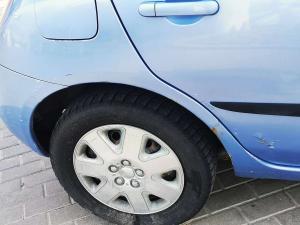 Blue Nissan Micra 2004 in Vilnius, with an engine capacity of 1.24 L and mileage of 210 thousand km for 1111 €, photo 12 on AUTOMOTO.COM.LV