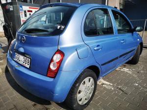 Blue Nissan Micra 2004 in Vilnius, with an engine capacity of 1.24 L and mileage of 210 thousand km for 1111 €, photo 13 on AUTOMOTO.COM.LV