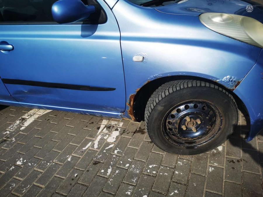 Blue Nissan Micra 2004 in Vilnius, with an engine capacity of 1.24 L and mileage of 210 thousand km for 1111 €, photo 14 on AUTOMOTO.COM.LV