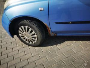Blue Nissan Micra 2004 in Vilnius, with an engine capacity of 1.24 L and mileage of 210 thousand km for 1111 €, photo 19 on AUTOMOTO.COM.LV