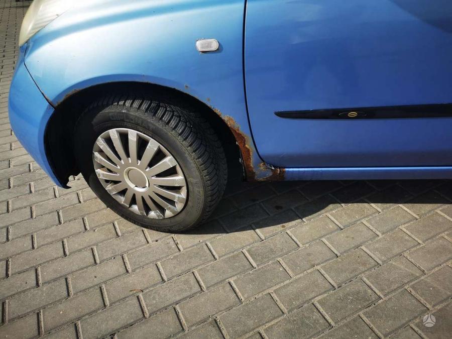 Blue Nissan Micra 2004 in Vilnius, with an engine capacity of 1.24 L and mileage of 210 thousand km for 1111 €, photo 19 on AUTOMOTO.COM.LV