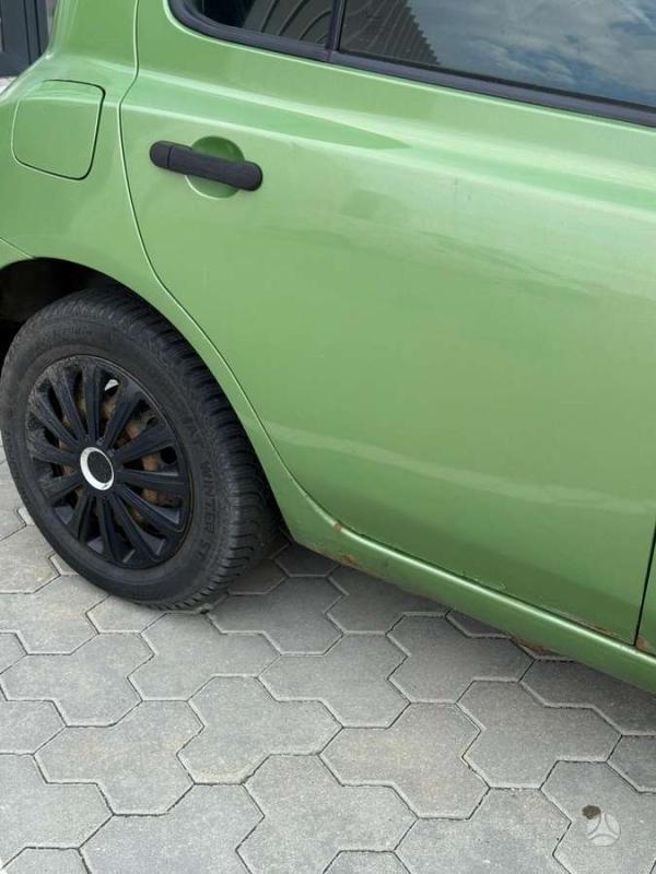 Green Nissan Micra 2003 in Vilnius, with an engine capacity of 1.24 L and mileage of 206 thousand km for 700 €, photo 6 on AUTOMOTO.COM.LV