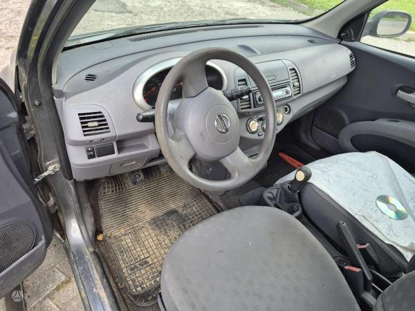 Grey Nissan Micra 2014 in Vilnius, with an engine capacity of 1.24 L and mileage of 126 thousand km for 500 €, photo 7 on AUTOMOTO.COM.LV