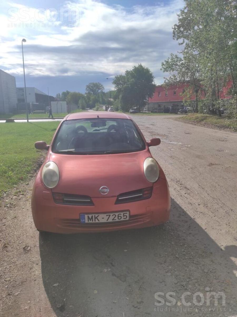Orange Nissan Micra 2004 in Riga, with an engine capacity of 1.00 L and mileage of 216 thousand km for 500 €, photo 1 on AUTOMOTO.COM.LV