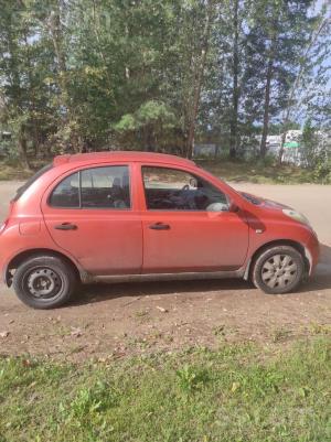 Orange Nissan Micra 2004 in Riga, with an engine capacity of 1.00 L and mileage of 216 thousand km for 500 €, photo 4 on AUTOMOTO.COM.LV