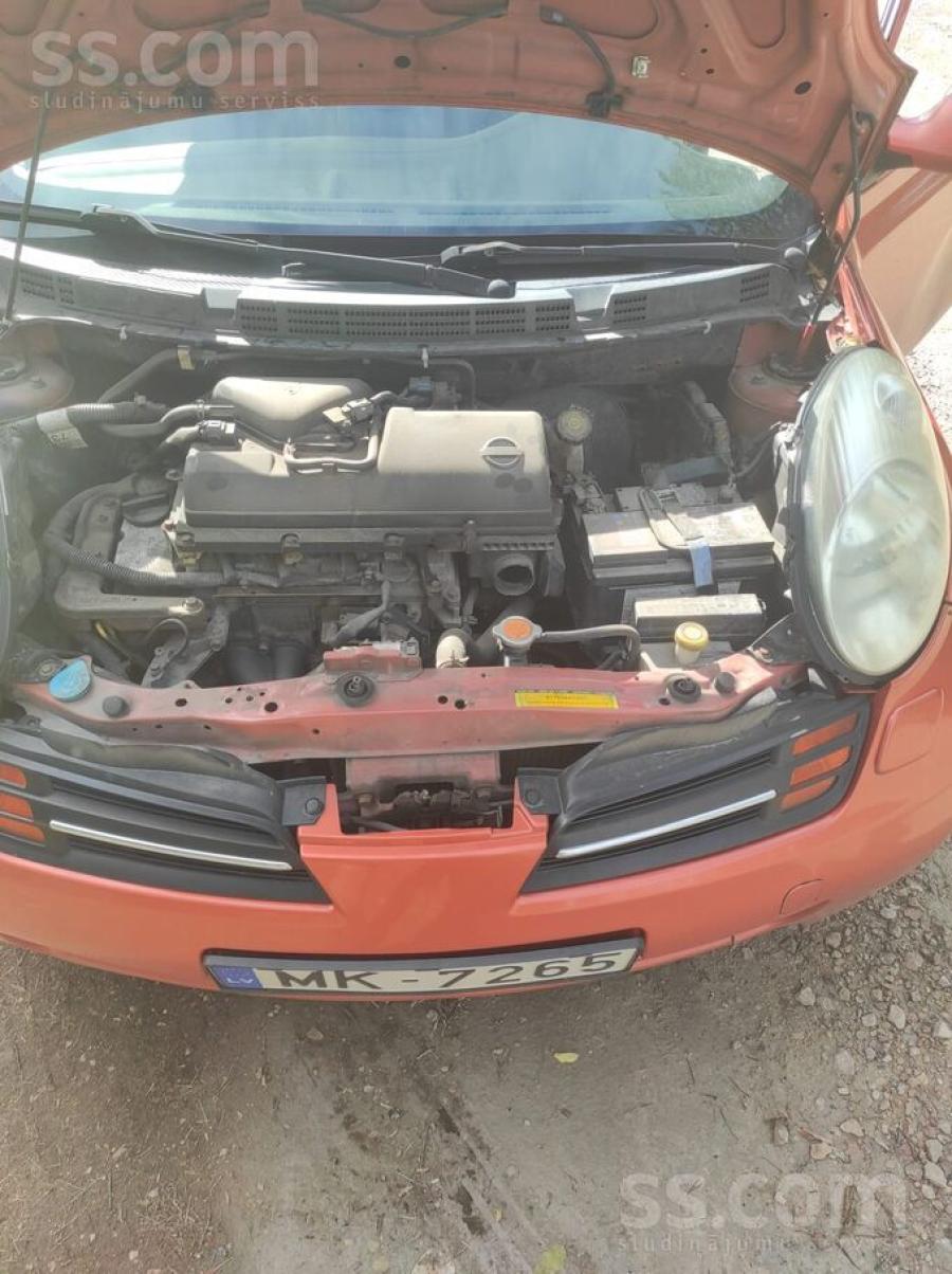 Orange Nissan Micra 2004 in Riga, with an engine capacity of 1.00 L and mileage of 216 thousand km for 500 €, photo 6 on AUTOMOTO.COM.LV