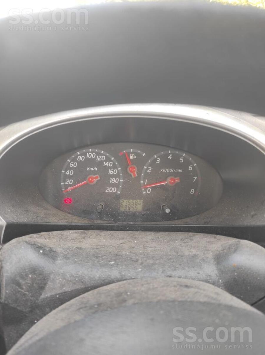 Orange Nissan Micra 2004 in Riga, with an engine capacity of 1.00 L and mileage of 216 thousand km for 500 €, photo 8 on AUTOMOTO.COM.LV