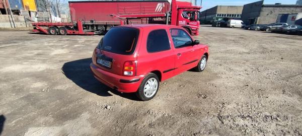 Red Nissan Micra 1999 in Riga, with an engine capacity of 1.00 L and mileage of 57 thousand km for 3499 €, photo 6 on AUTOMOTO.COM.LV