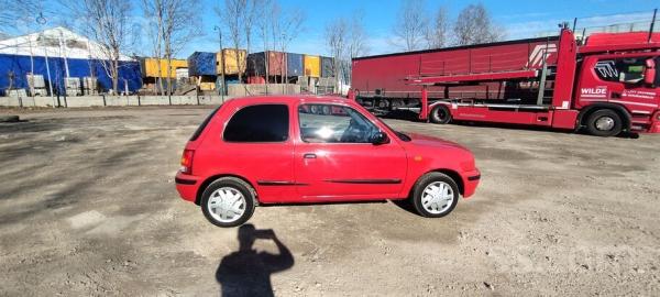 Red Nissan Micra 1999 in Riga, with an engine capacity of 1.00 L and mileage of 57 thousand km for 3499 €, photo 7 on AUTOMOTO.COM.LV