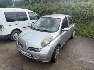 Red Nissan Micra 2005 in Vilnius, with an engine capacity of 1.24 L and mileage of 200 thousand km for 499 €, photo  on AUTOMOTO.COM.LV