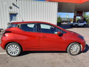 Red Nissan Micra 2021 in Vilnius, with an engine capacity of 1.00 L and mileage of 133 thousand km for 10500 €, photo  on AUTOMOTO.COM.LV