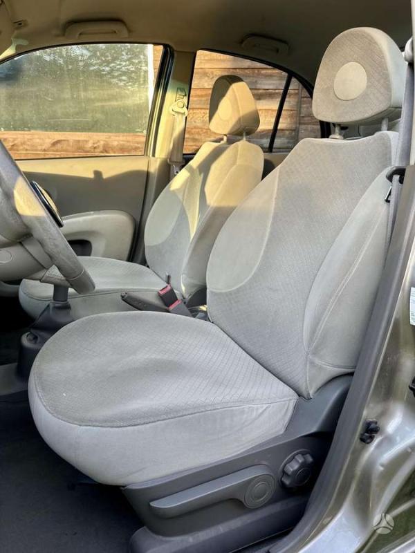 Yellow Nissan Micra 2005 in Vilnius, with an engine capacity of 1.24 L and mileage of 144 thousand km for 2890 €, photo 9 on AUTOMOTO.COM.LV