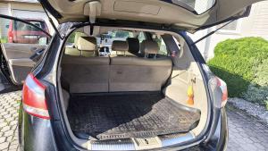 Black Nissan Murano 2012 in Jonava, with an engine capacity of 2.49 L and mileage of 280 thousand km for 6000 €, photo 12 on AUTOMOTO.COM.LV