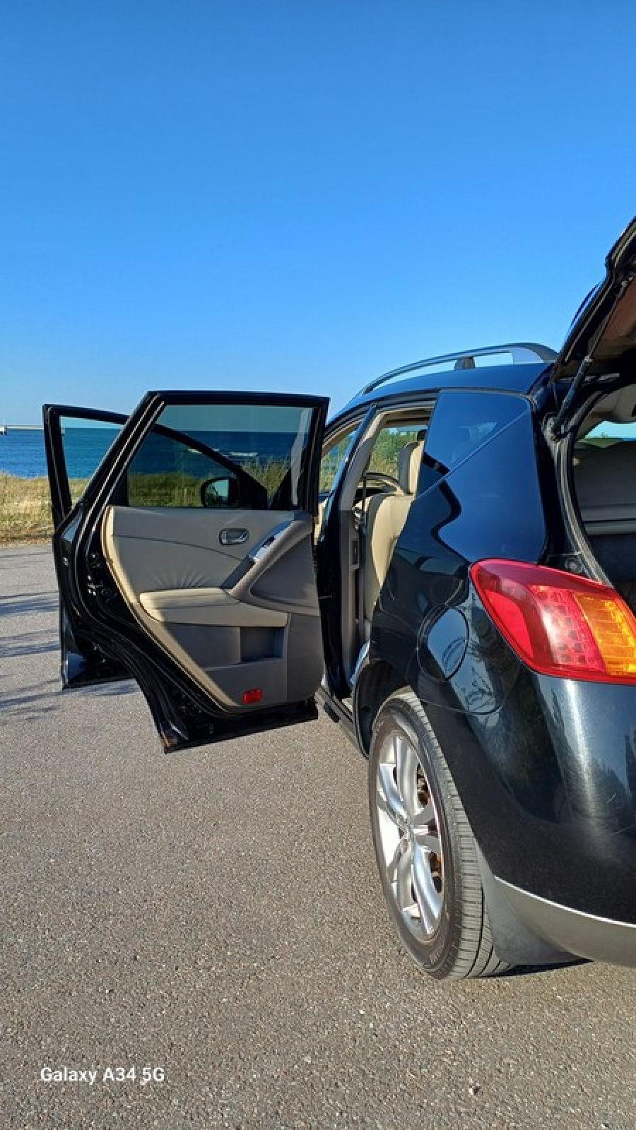 Black Nissan Murano 2011 in Paldiski, with an engine capacity of 0.00 L and mileage of 255 thousand km for 7000 €, photo 16 on AUTOMOTO.COM.LV