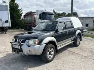 Black Nissan Navara 2006 in Valka, with an engine capacity of 2.50 L and mileage of 260 thousand km for 2800 €, photo  on AUTOMOTO.COM.LV