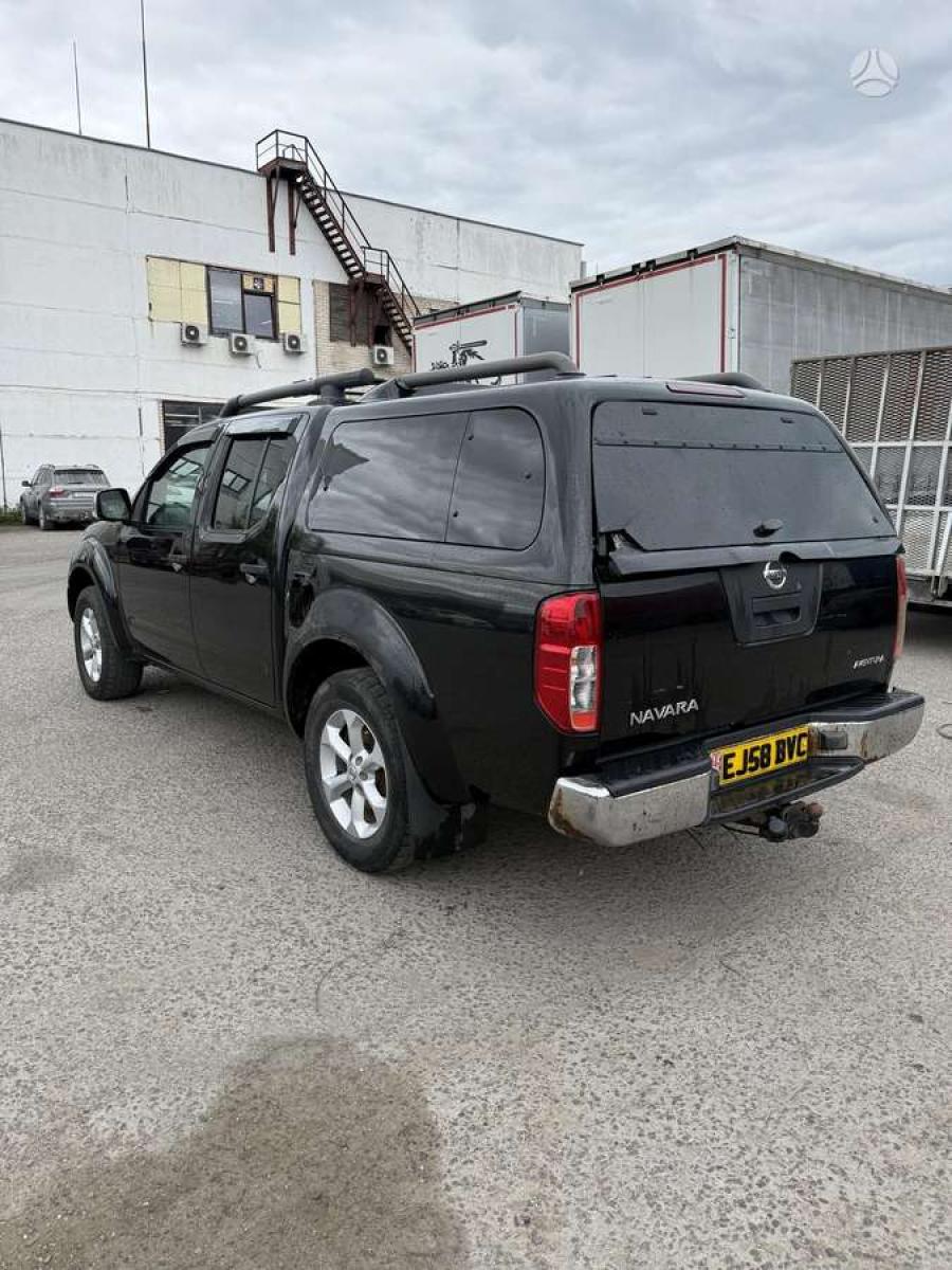 Melns Nissan Navara 2008 Panevēža, ar dzinēja tilpumu 2.50 L un nobraukumu 201 tūkst. km par 2500 €, foto 4 vietnē AUTOMOTO.COM.LV