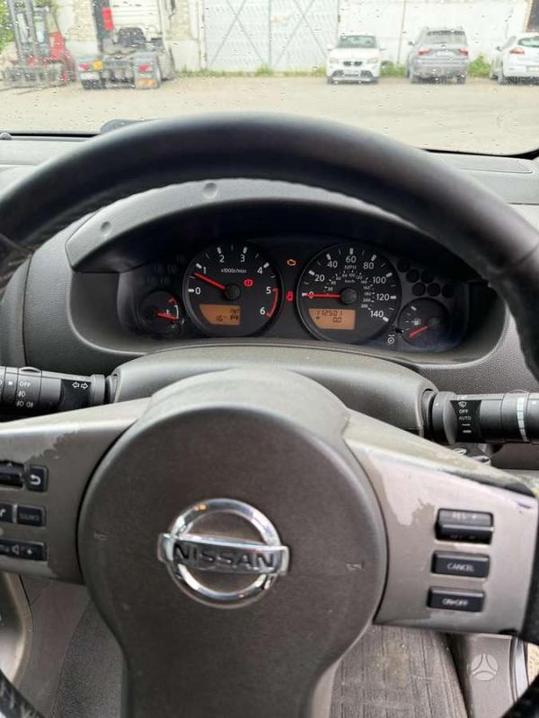 Black Nissan Navara 2008 in Panevezys, with an engine capacity of 2.50 L and mileage of 201 thousand km for 2500 €, photo 7 on AUTOMOTO.COM.LV