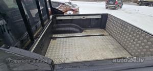 Melns Nissan Navara 2012 Tallina, ar dzinēja tilpumu 2.50 L un nobraukumu 366 tūkst. km par 8500 €, foto 9 vietnē AUTOMOTO.COM.LV