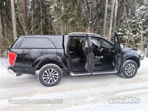 Black Nissan Navara 2016 in Tallinn, with an engine capacity of 2.30 L and mileage of 246 thousand km for 19000 €, photo 18 on AUTOMOTO.COM.LV
