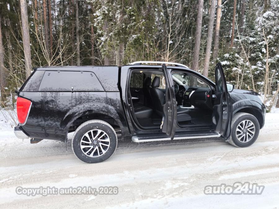 Black Nissan Navara 2016 in Tallinn, with an engine capacity of 2.30 L and mileage of 246 thousand km for 19000 €, photo 18 on AUTOMOTO.COM.LV