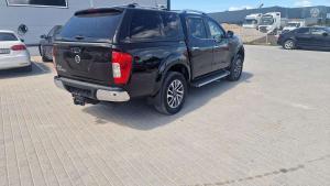 Black Nissan Navara 2016 in Siauliai, with an engine capacity of 2.30 L and mileage of 267 thousand km for 14500 €, photo 5 on AUTOMOTO.COM.LV