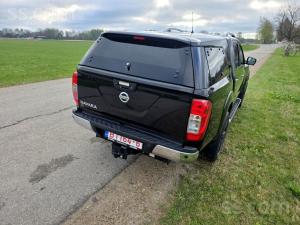 Black Nissan Navara 2017 in Cesis, with an engine capacity of 2.30 L and mileage of 214 thousand km for 17787 €, photo 19 on AUTOMOTO.COM.LV
