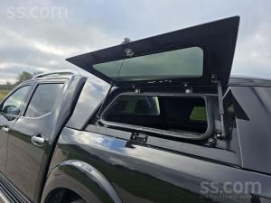 Black Nissan Navara 2017 in Cesis, with an engine capacity of 2.30 L and mileage of 214 thousand km for 17787 €, photo 32 on AUTOMOTO.COM.LV