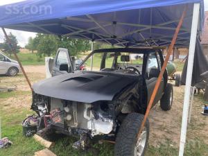 Melns Nissan Navara 2003 Kuldīga, ar dzinēja tilpumu 2.50 L un nobraukumu 0 tūkst. km par 9500 €, foto 12 vietnē AUTOMOTO.COM.LV