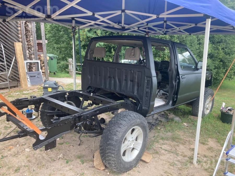 Melns Nissan Navara 2003 Kuldīga, ar dzinēja tilpumu 2.50 L un nobraukumu 0 tūkst. km par 9500 €, foto 13 vietnē AUTOMOTO.COM.LV