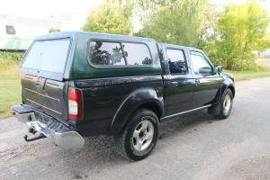Black Nissan Navara 2004 in Prienai, with an engine capacity of 2.50 L and mileage of 300 thousand km for 3800 €, photo 3 on AUTOMOTO.COM.LV