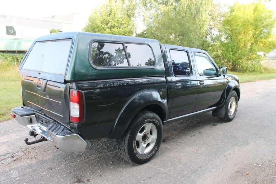 Black Nissan Navara 2004 in Prienai, with an engine capacity of 2.50 L and mileage of 300 thousand km for 3800 €, photo 3 on AUTOMOTO.COM.LV