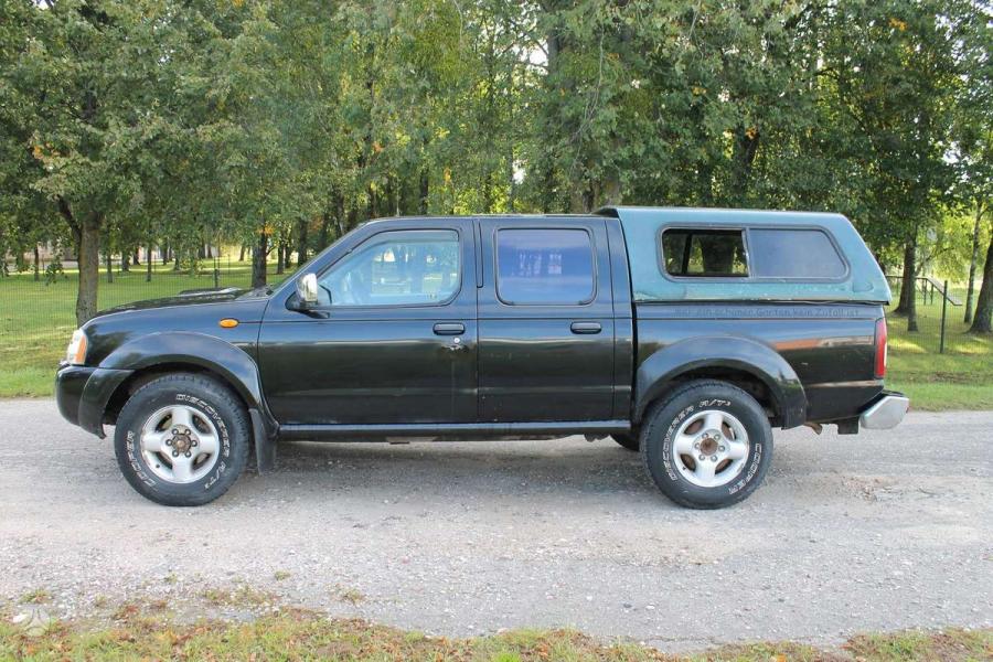 Black Nissan Navara 2004 in Prienai, with an engine capacity of 2.50 L and mileage of 300 thousand km for 3800 €, photo 7 on AUTOMOTO.COM.LV