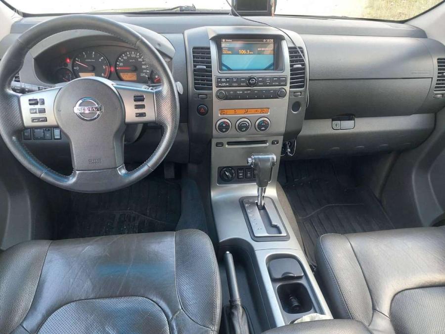 Melns Nissan Navara 2006 Molėtai, ar dzinēja tilpumu 2.50 L un nobraukumu 281 tūkst. km par 6800 €, foto 13 vietnē AUTOMOTO.COM.LV