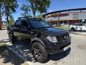 Black Nissan Navara 2007 in Riga, with an engine capacity of 2.50 L and mileage of 249 thousand km for 4200 €, photo  on AUTOMOTO.COM.LV