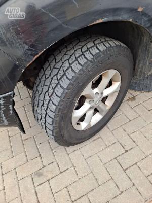 Black Nissan Navara 2008 in Panevezys, with an engine capacity of 2.50 L and mileage of 174 thousand km for 4000 €, photo 12 on AUTOMOTO.COM.LV
